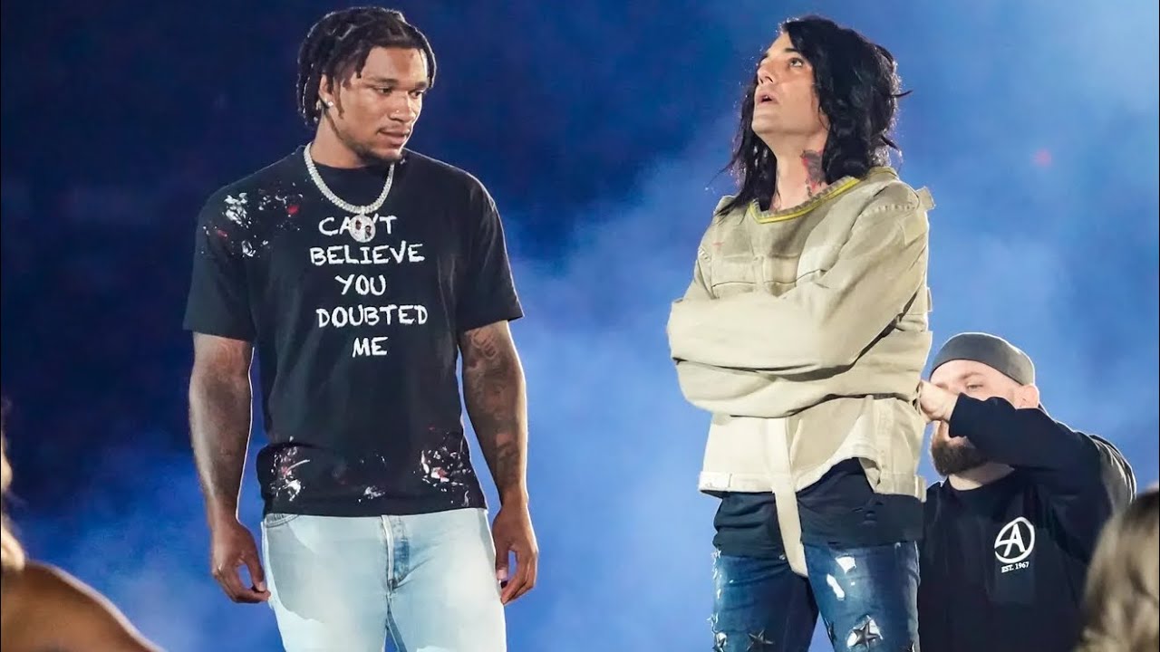 Criss Angel escapes straight jacket while upside down hanging from roof ...