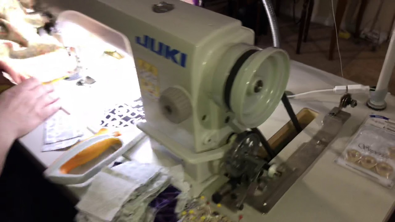 Winding the bobbin on a Juki DU-1181 industrial sewing machine and ...