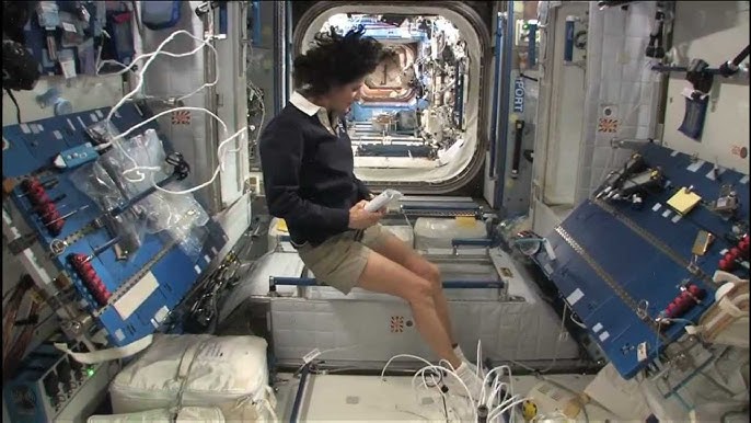Astronaut Washing Hair In Space