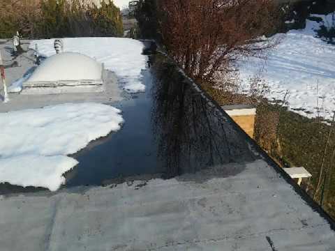 Flat Roof water puddle - YouTube