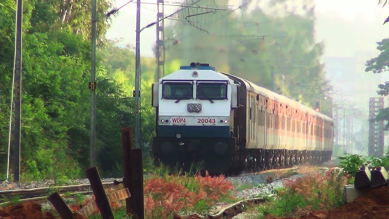 Shining KJM EMD WDP4 at full thorttle with bangalore rajdhani express ...