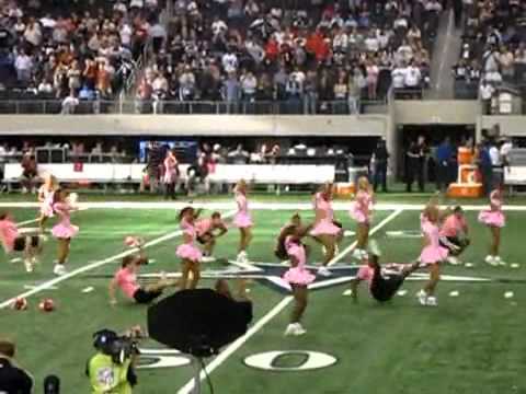 The Dallas Cowboys Cheerleaders perform in pink with the Cheer ...