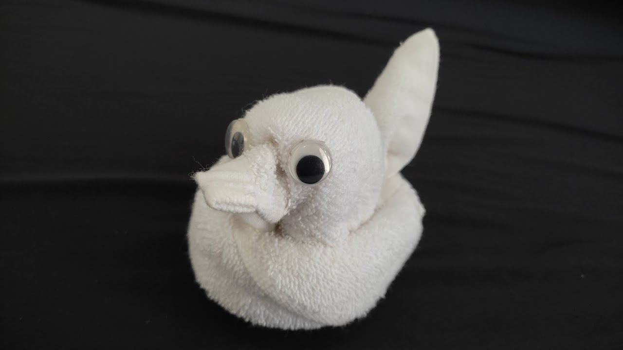 Towel folding bird - towel art - YouTube