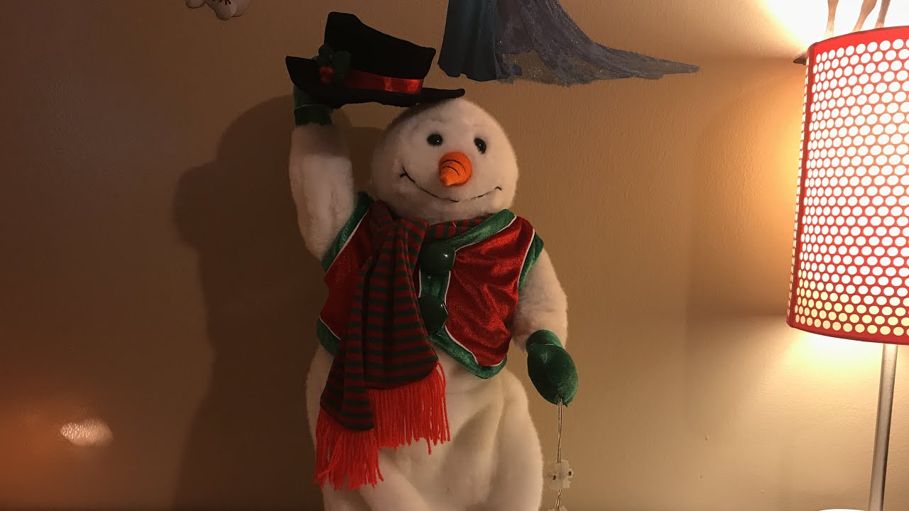 (Gemmy) snowflake spinning snowman (Green trim, Red vest) - YouTube