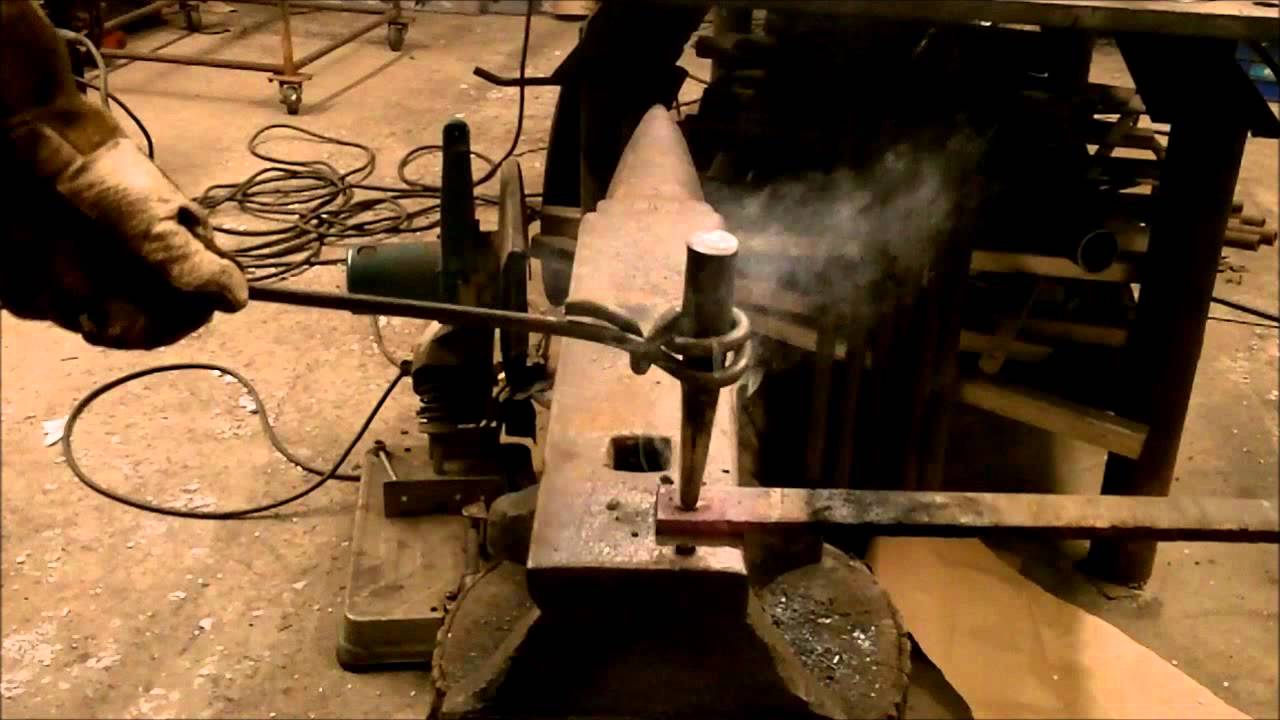 Basic Blacksmithing Hot Punching Steel - YouTube