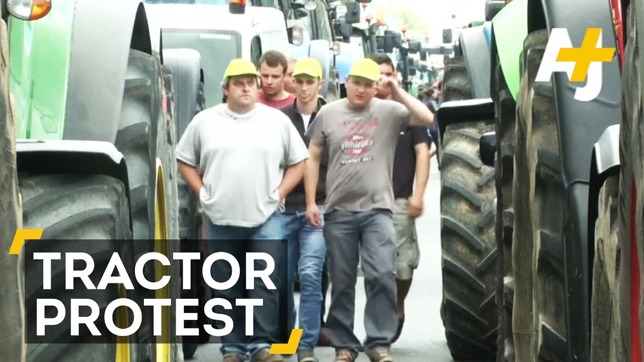 French Farmers Show Up To Paris Protest In Tractors - YouTube