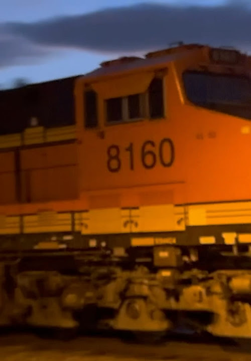 BNSF 8160 trails an OCS train at Longmont - YouTube
