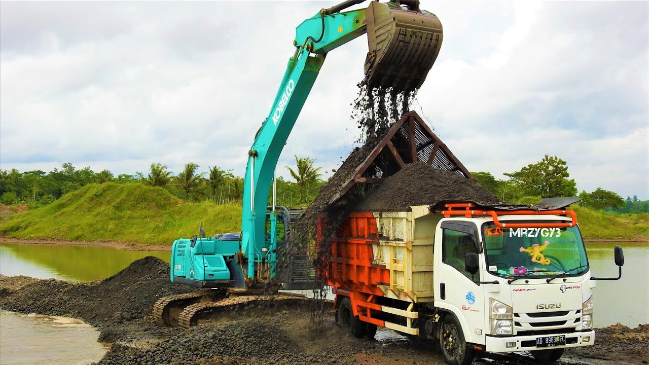 Fully Overloaded Dump Trucks By Excavators On Sand Quarry - YouTube
