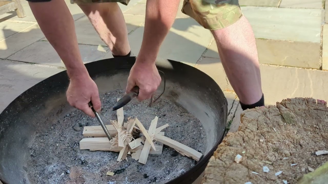 one log fire to a boiling cup of water - YouTube