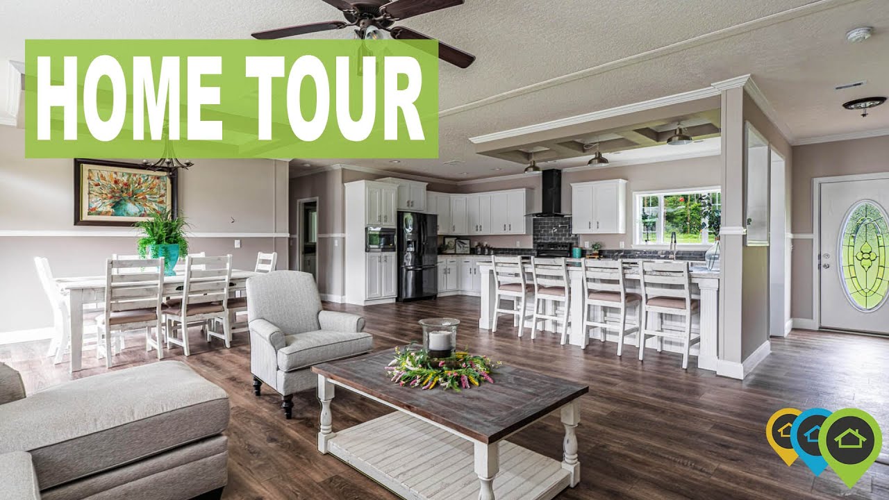 Manufactured Home featuring a large open concept chef’s style kitchen ...