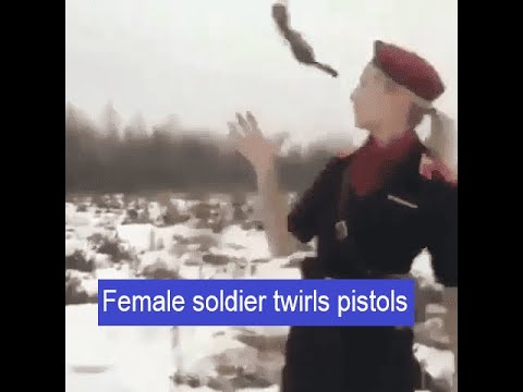 [24] Female soldier twirls pistols