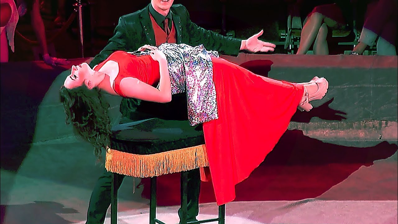 Circus. Magician and lady in red. - YouTube