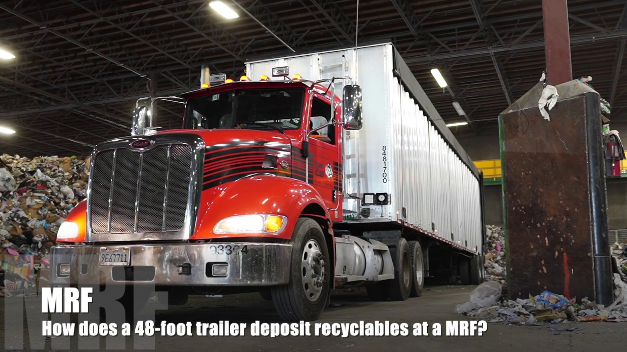 How does a 48-foot trailer deposit recyclables at a MRF? - YouTube