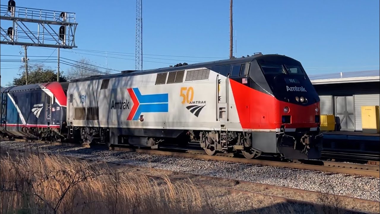 Amtrak 161 leads the Silver Star! Along with a Brand New CSX engine ...