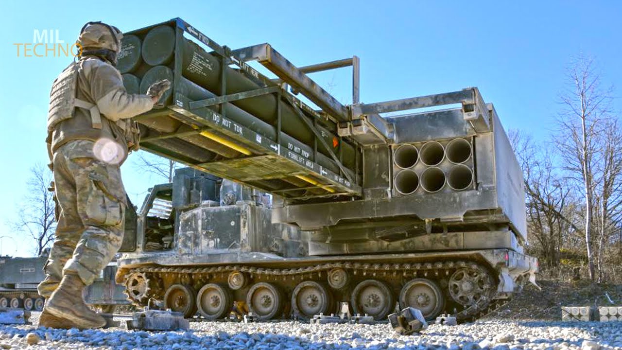 U.S. Soldiers prepare and load M270 MLRS and M142 HMARS - YouTube