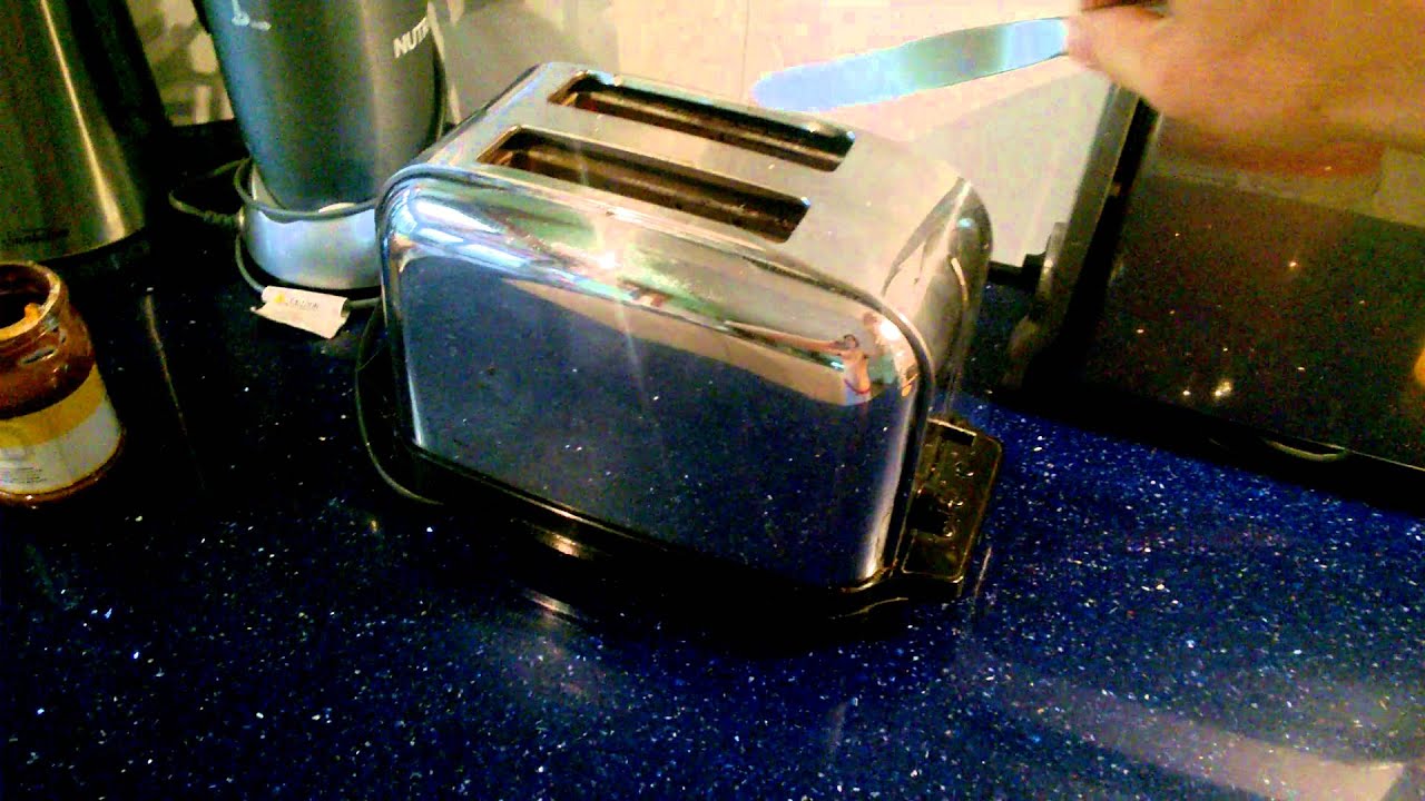 how to get bread out of a toaster with a knife - YouTube