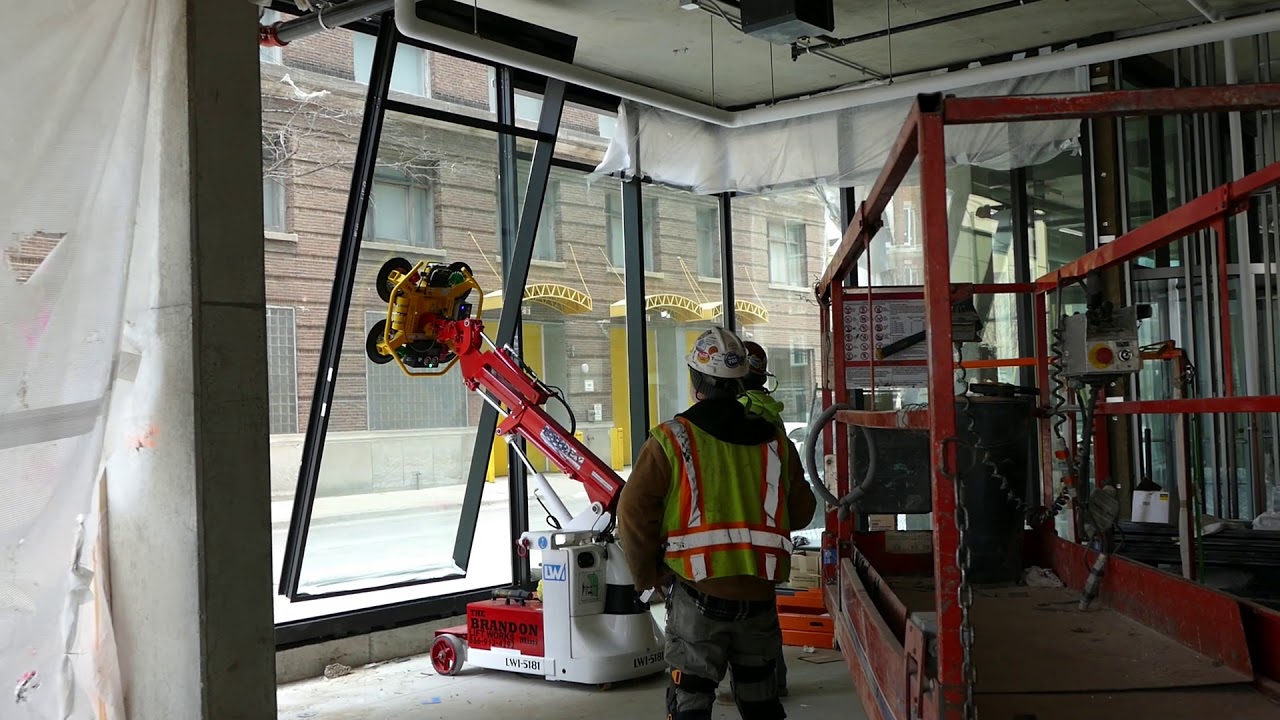 Installing a window wall panel with a manipulator-5x - YouTube