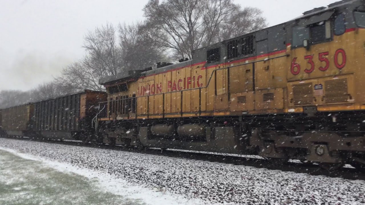 UP 5636 (AC44CW) leads a Eastbound Union Pacific coal train through snowy Rochelle, IL 04/15/18 ...
