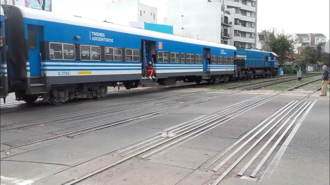 GM GT-22 CW-2 A909 con tren de pasajeros 4512 Haedo-Temperley de 10.05 saliendo de Haedo - YouTube