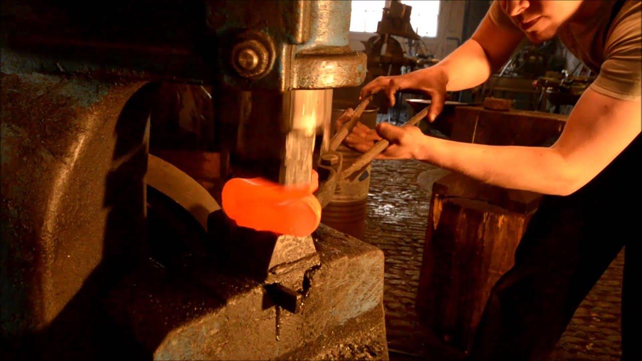 Forged bronze cat - YouTube