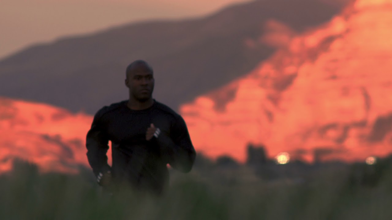 man running towards camera in slow motion - YouTube