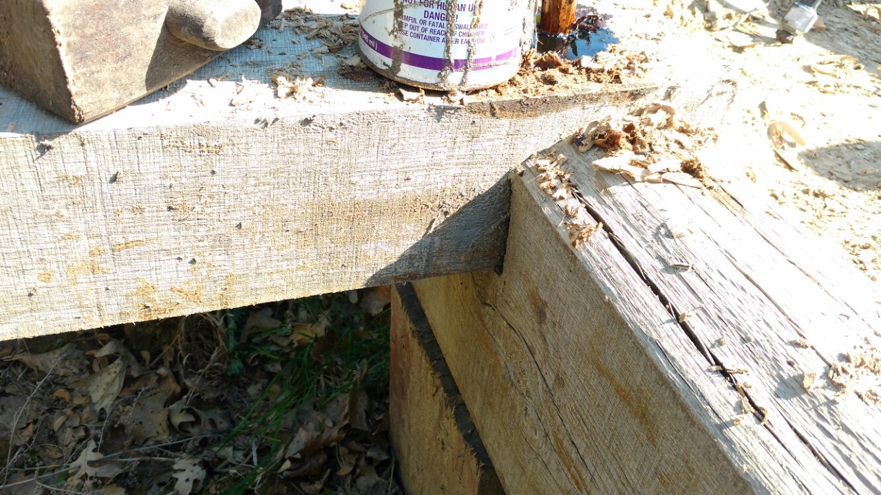 Pining the floor joists to the sill logs.. - YouTube