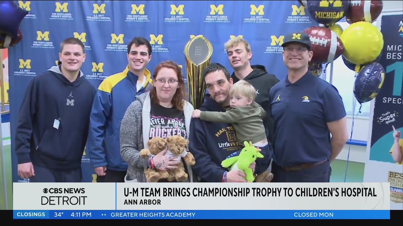 Michigan football team brings CFP National Championship trophy to Mott ...