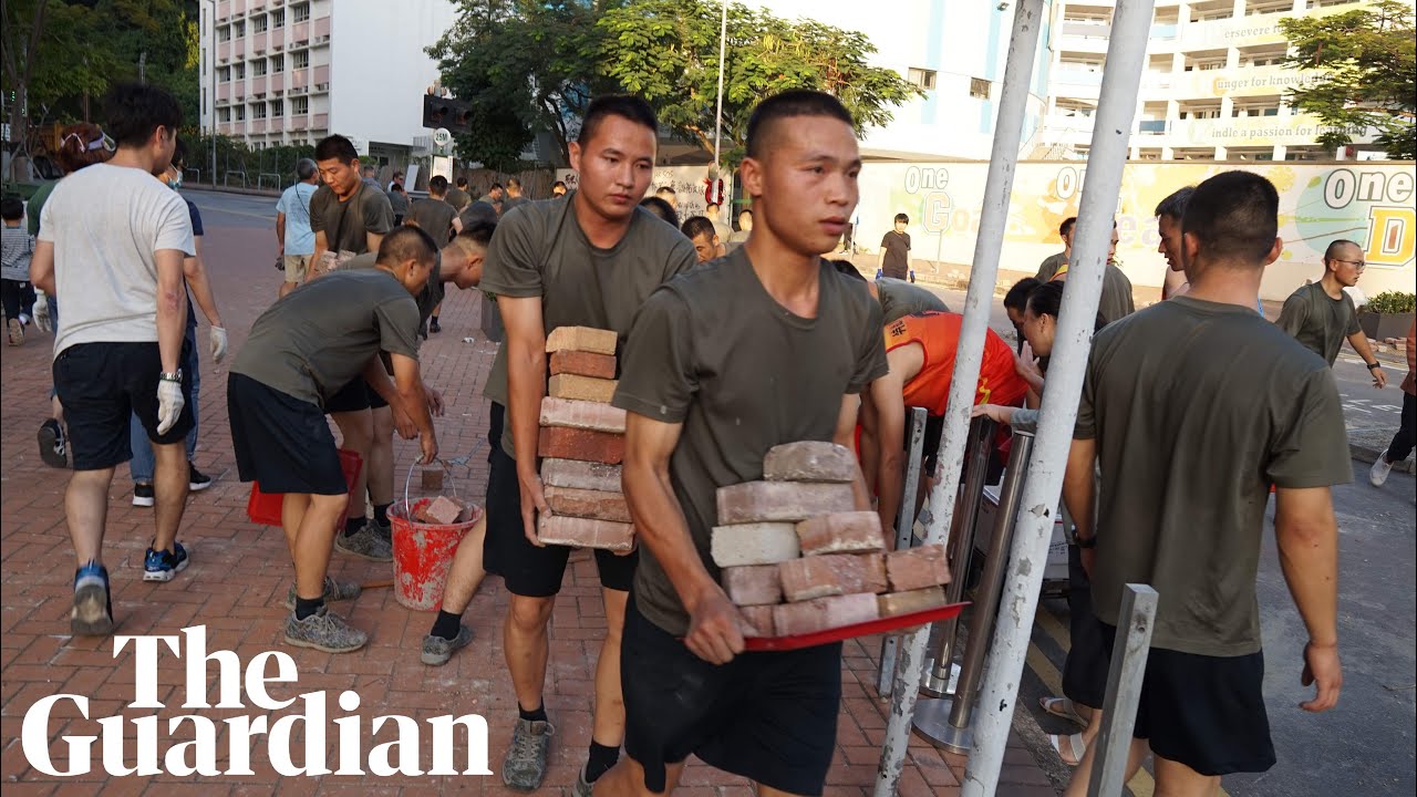 Hong Kong: China deploys troops to help clear roadblocks at university ...