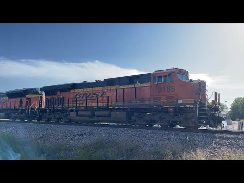 BNSF 8185 leads BNSF V-BIRLPC at the hotel - YouTube