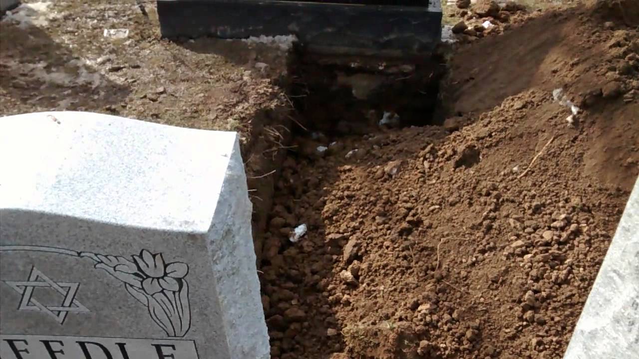 Filling in a grave 2015 st louis - YouTube