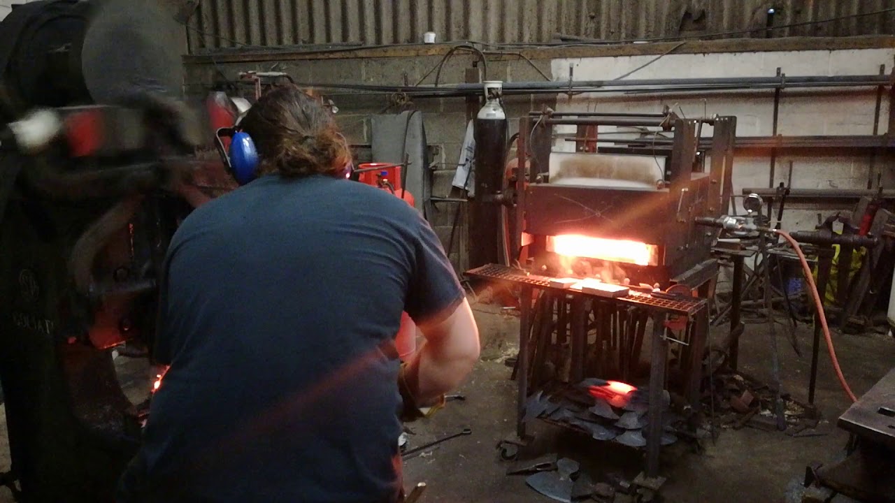 Forging with power hammer, two furnaces - YouTube