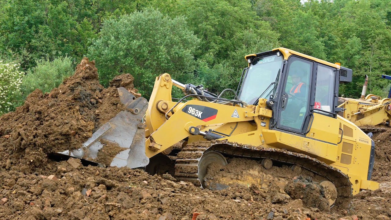 Cat 963K and Komatsu D75S Track Loaders - YouTube
