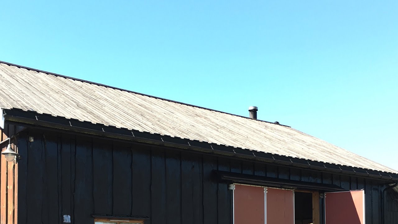 Påføring av Møretyri Tømmerolje på tretak - YouTube