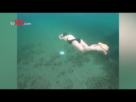 Rus yüzücüden buz altında rekor: 85 metre yüzdü
