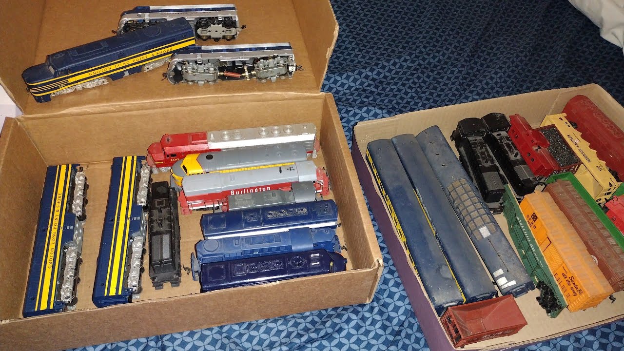 Aquired some Ho scale stuff from my Uncle . rolling stock etc added to ...