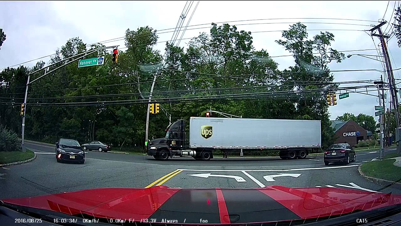 Impatient driver passes ups truck turning left on the left side. - YouTube