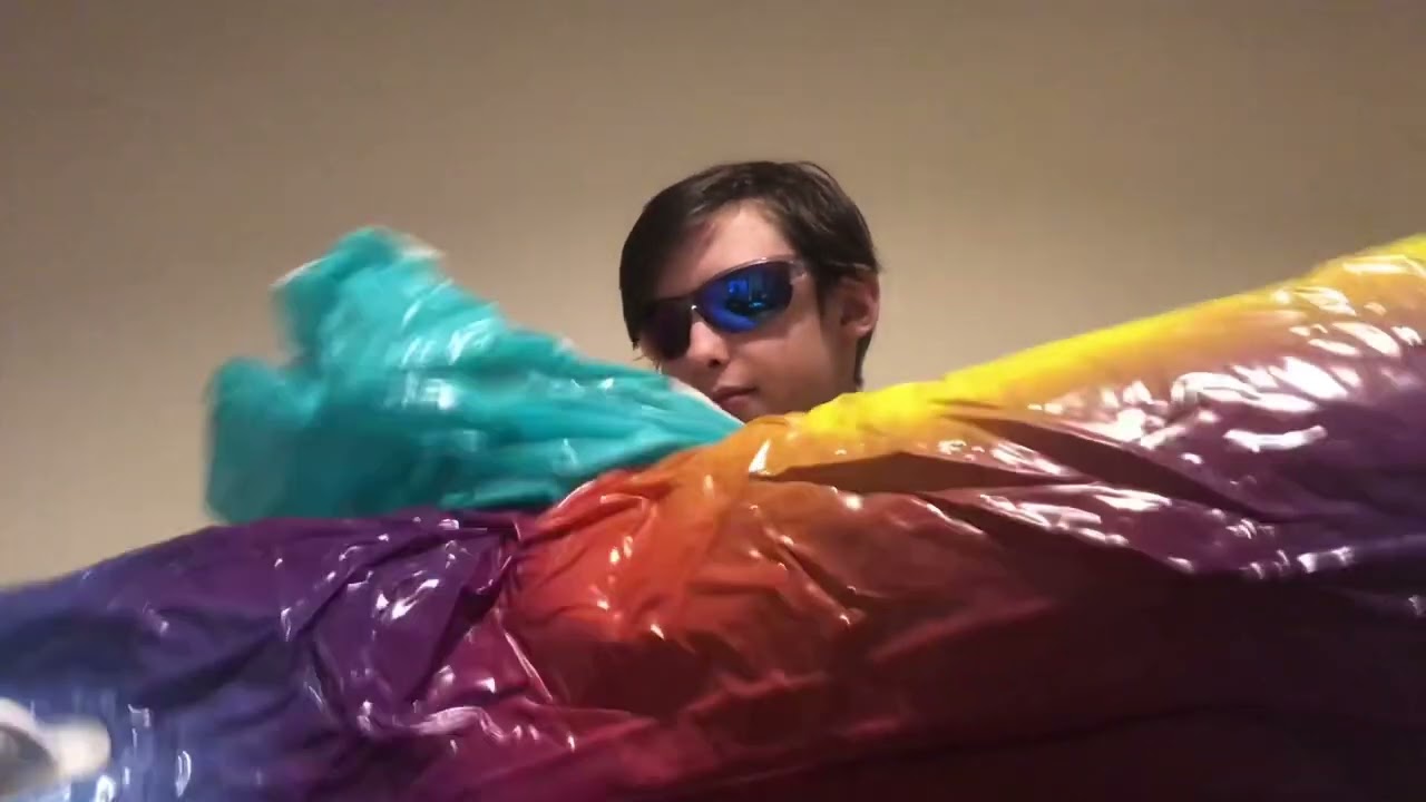 Inflating giant rainbow inflatable seal - YouTube