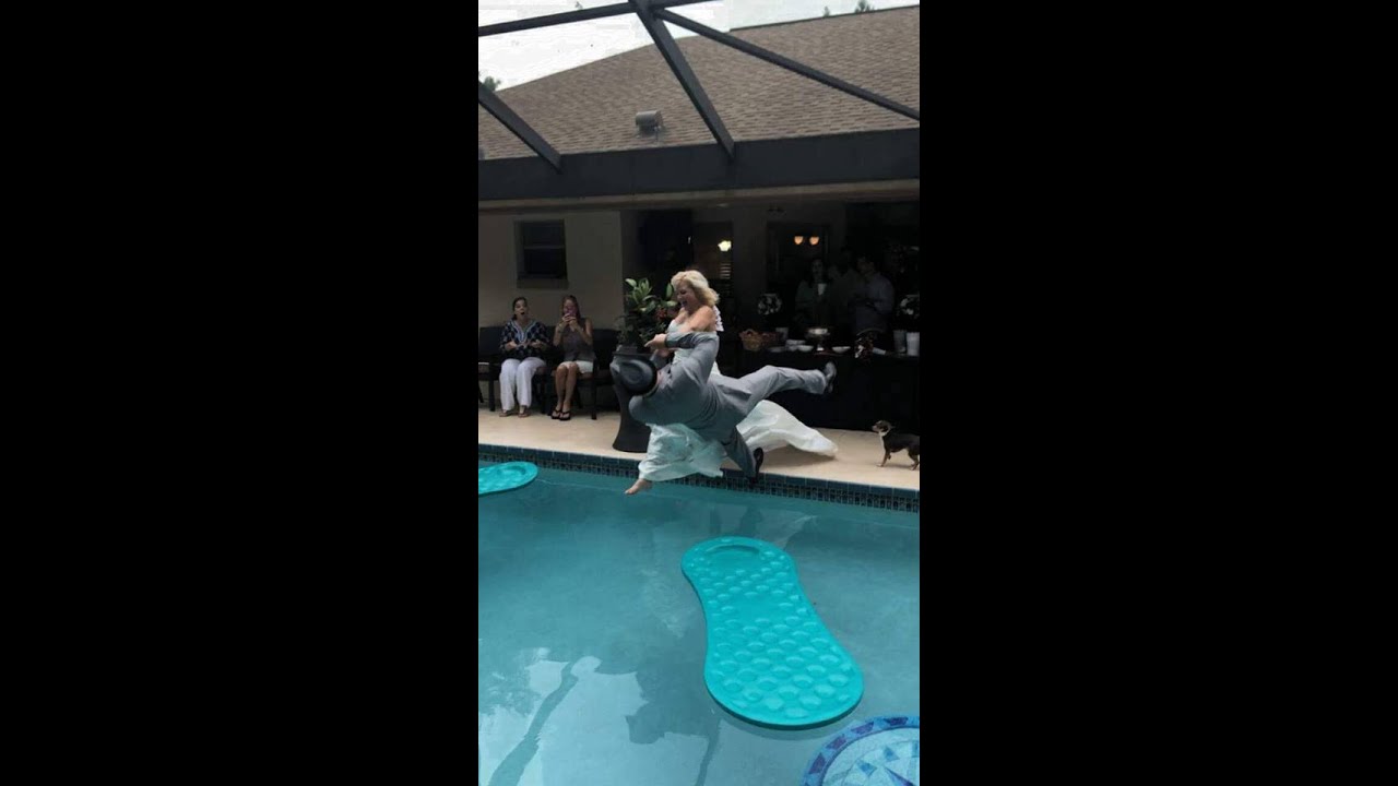 Bride goes swimming. - YouTube