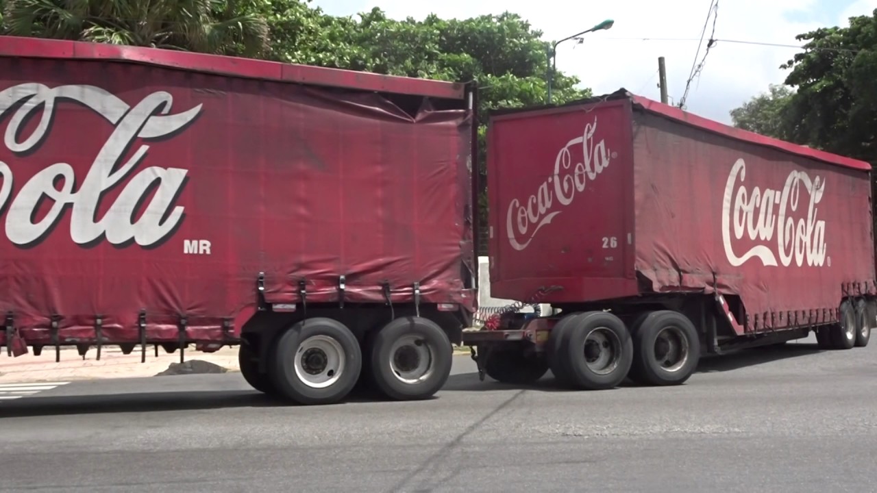 International with a Coca Cola road train - YouTube