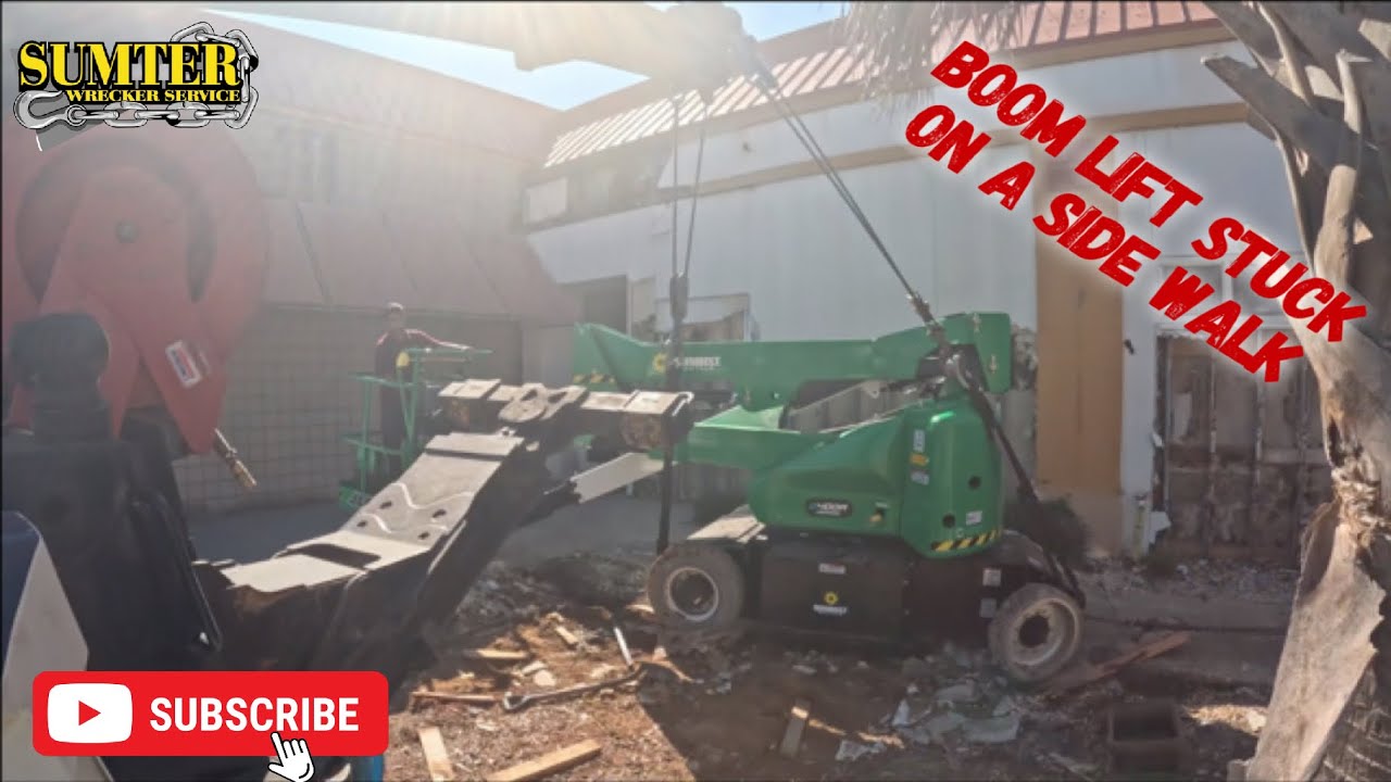Boom Lift stuck on a side walk - YouTube