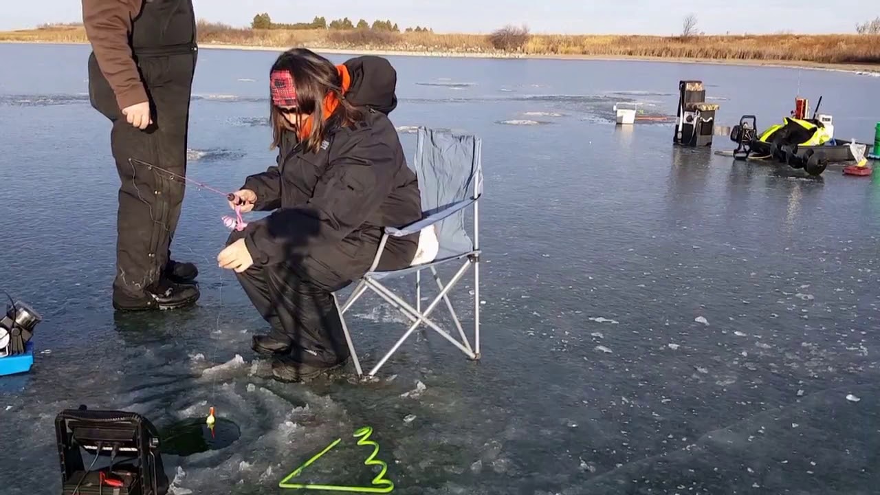 Early ice fishing fun - YouTube