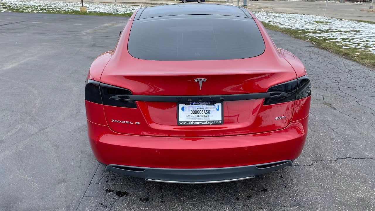 Replace Tesla chrome emblem letters with black - YouTube