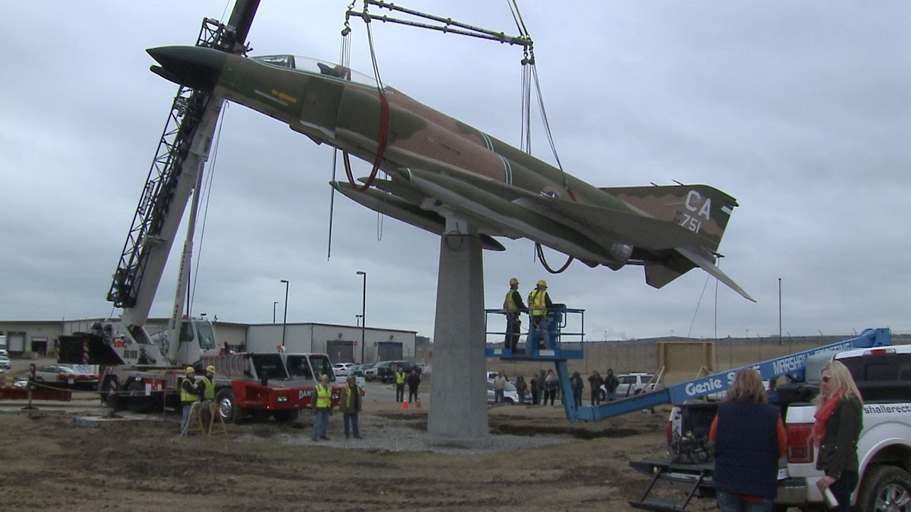 Fighter jet to be lifted into place at Mitchell International Airport ...