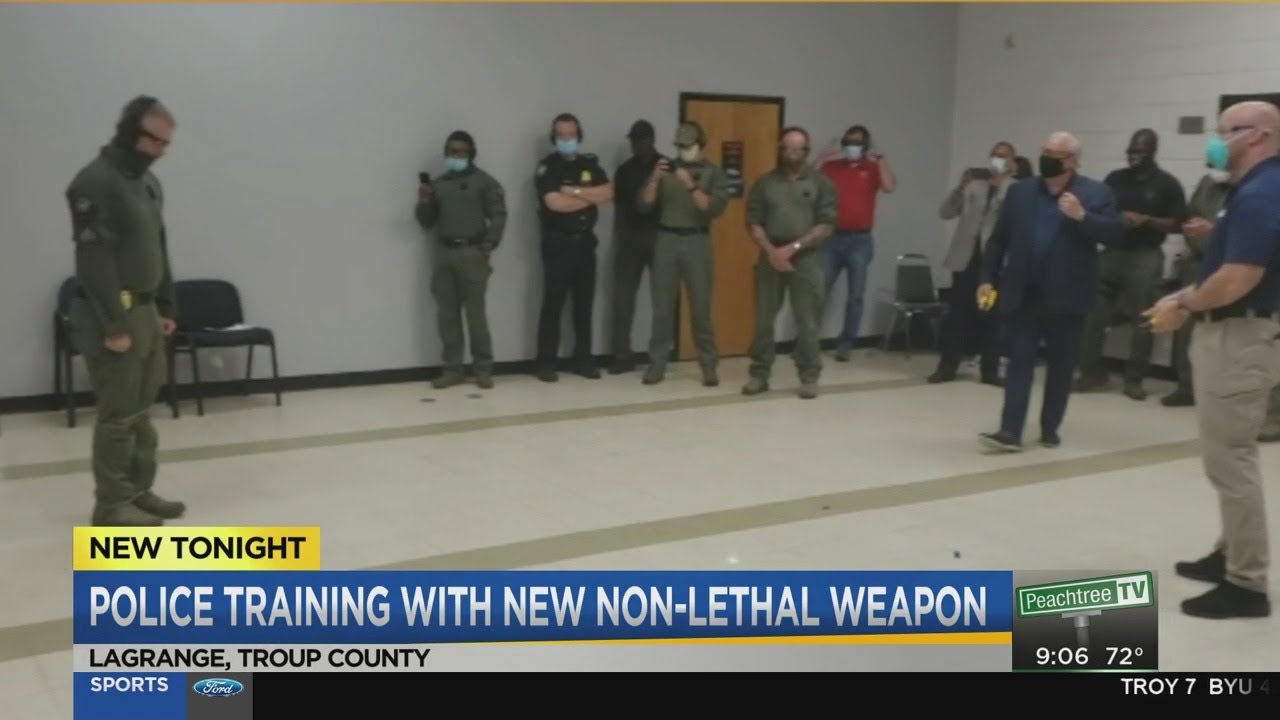 Police training with new non-lethal weapon - YouTube