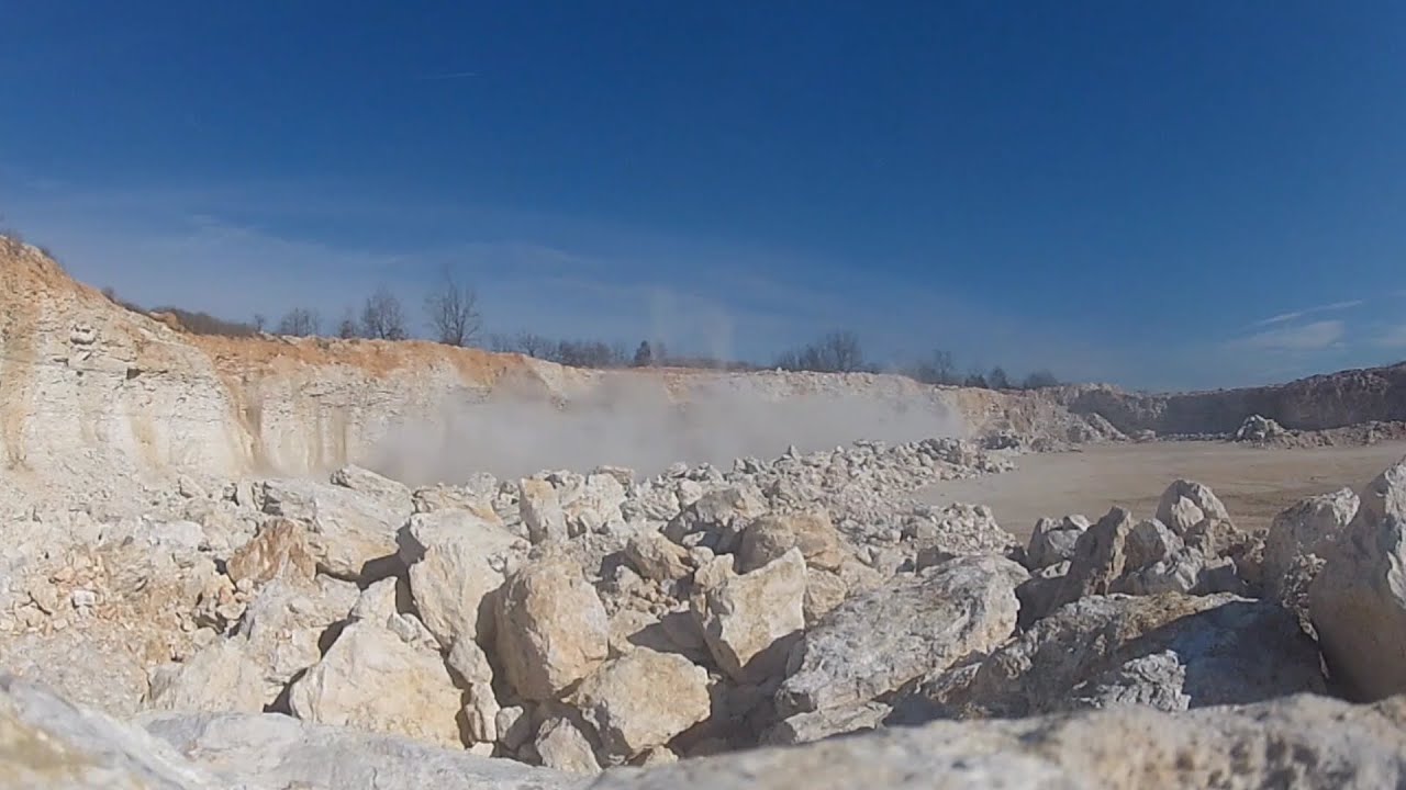Rock quarry blasting - YouTube