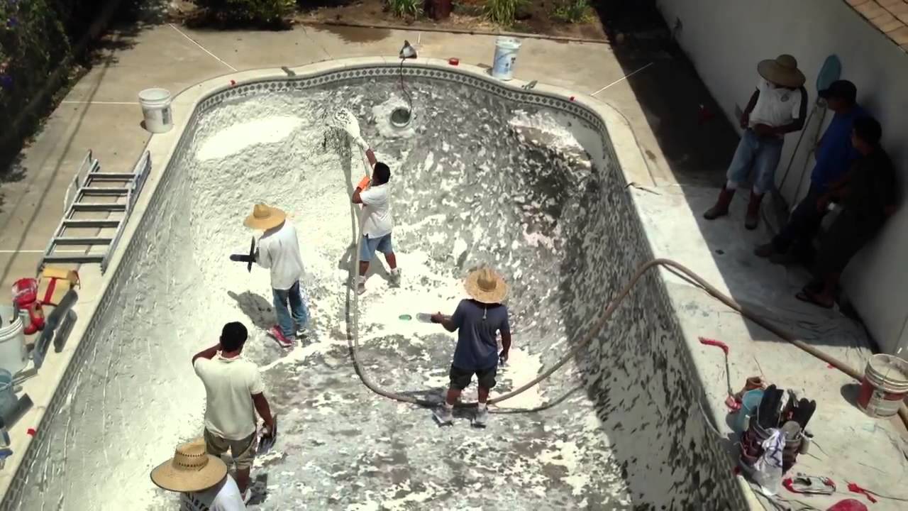 Plastering the pool - YouTube