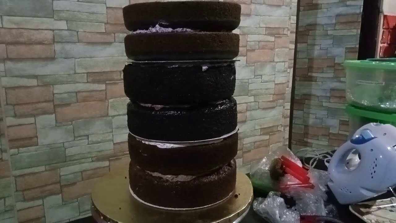 STACKING A MASSIVE 8x16 CAKE #omo - YouTube