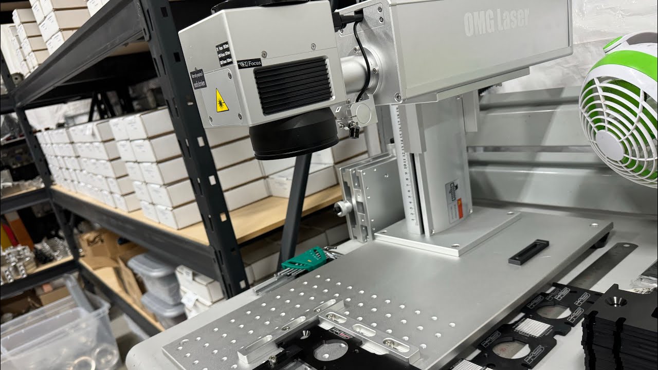 Laser engraving white on black anodized aluminum - YouTube
