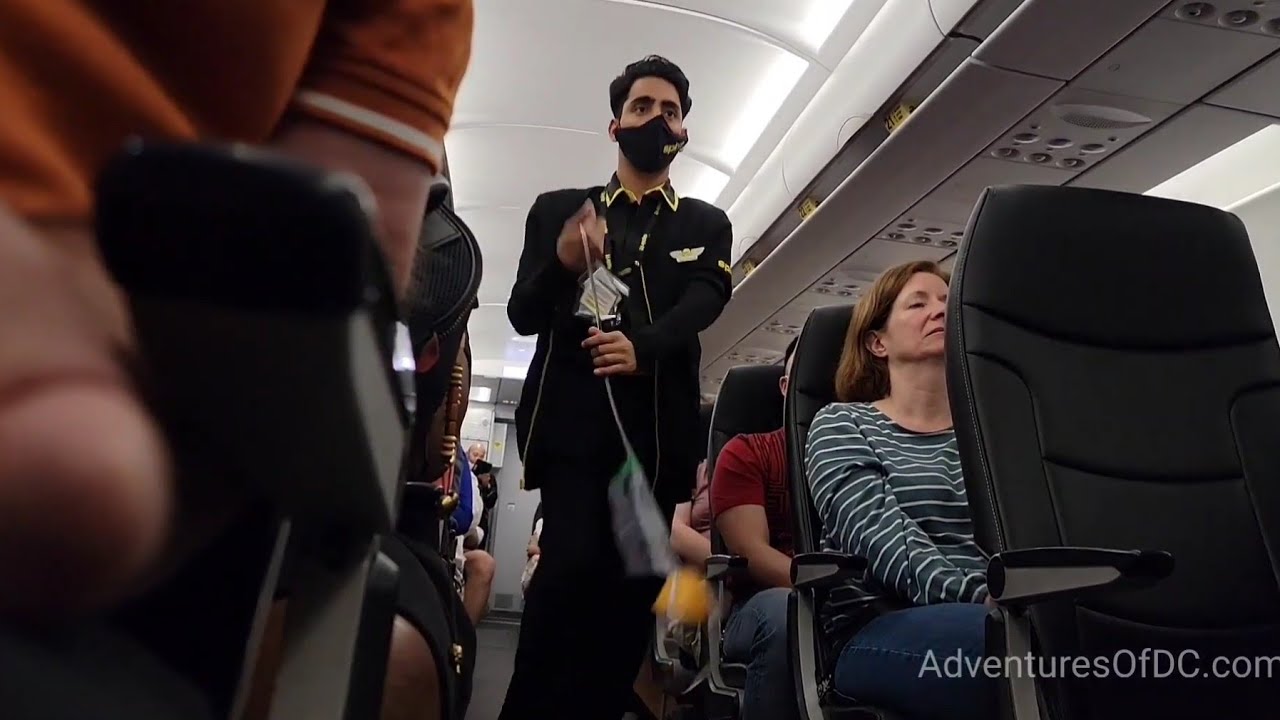 Spirit airlines Has The Most Flamboyant Flight Attendant - YouTube