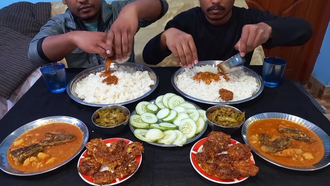 Karela tarkari, bandha kobi pakoda, salad, spicy chilli achar, bodi ...